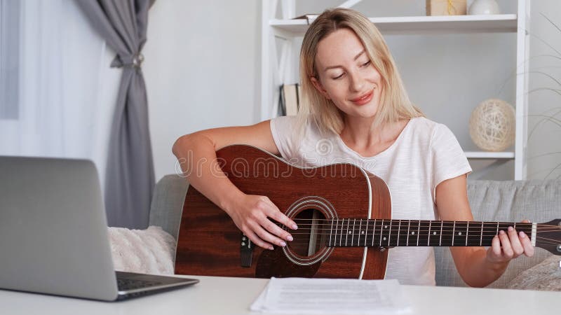 Online Guitar Tutorial Music Lesson Woman Learning Stock Photo - Image ...