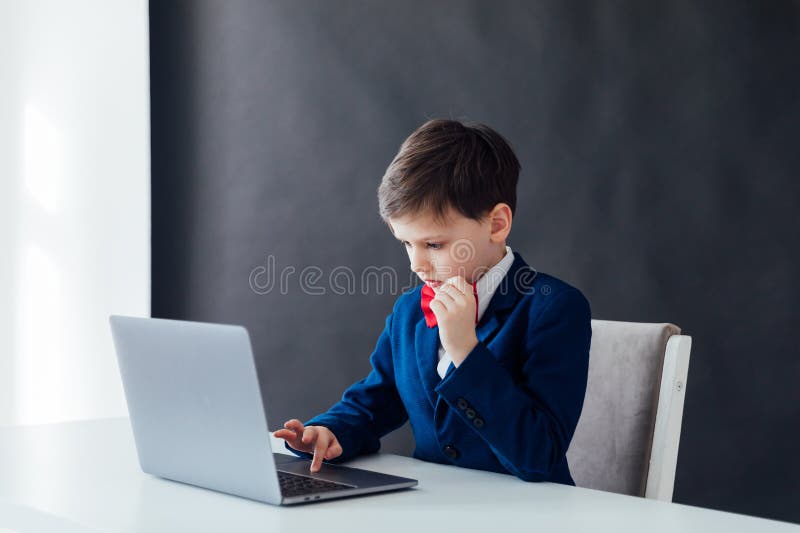 Online Learning Boy at the Computer in the Classroom Stock Photo ...