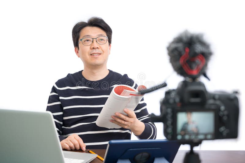 Online Learning Concept. an Asian Middle-aged Male Teacher Preparing To ...