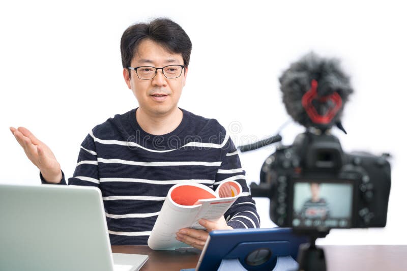 Online Learning Concept. an Asian Middle-aged Male Teacher Preparing To ...