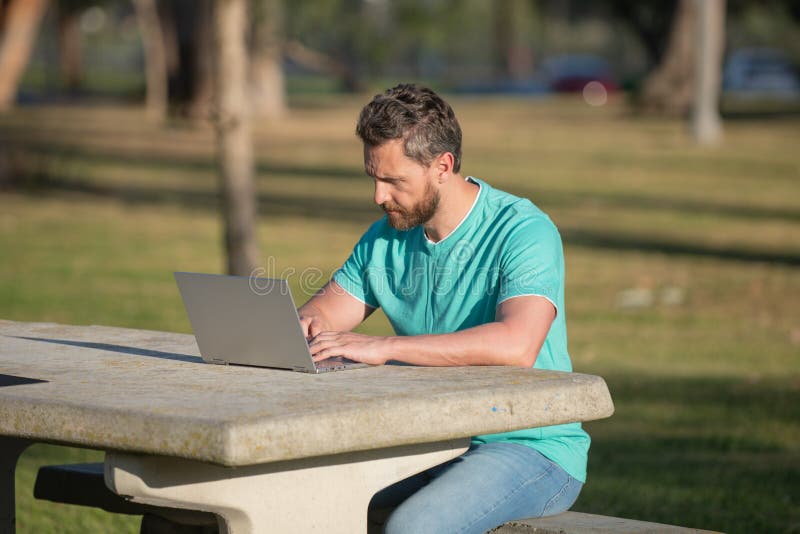 Online Learning in Nature. Man Online Work Outside. Stock Photo - Image ...