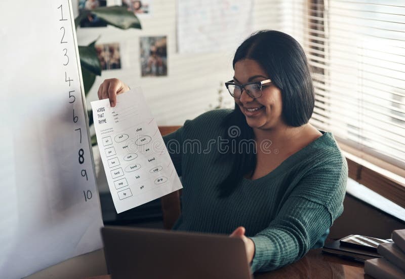 Online Learning is Still Learning. a Young Woman Using a Laptop To ...