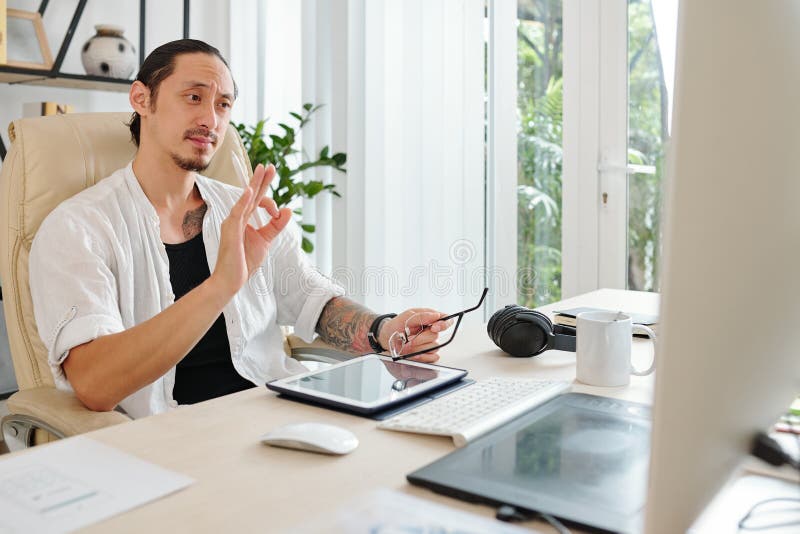 Online meeting with client stock image. Image of mixedrace - 214610873