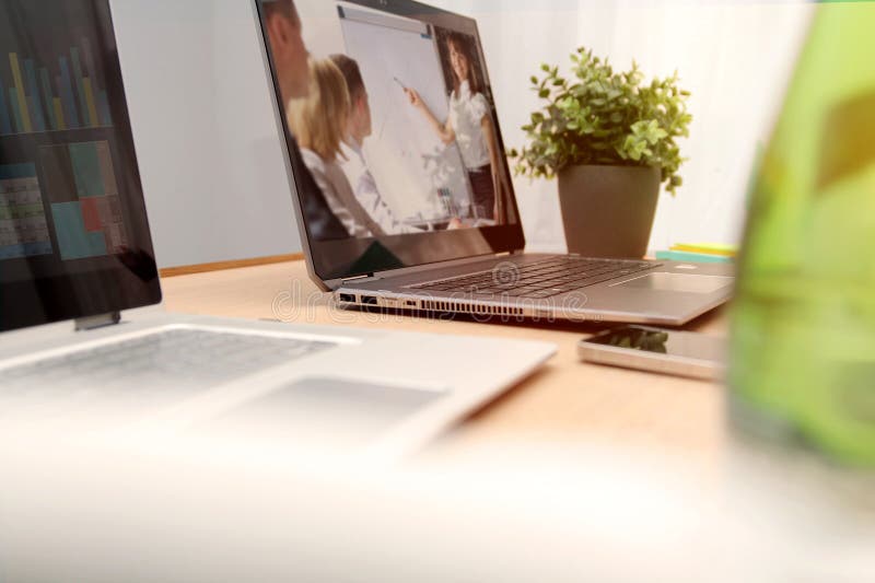 Online Remote Business Presentation is on a Laptop in the Office Stock ...