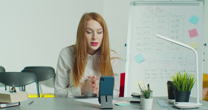 Online Schooling, E-learning. Female Teacher is Holding Online Lesson ...