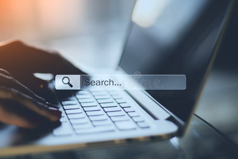 Online Searching Concept with Human Hands Typing on Laptop Keyboard and ...