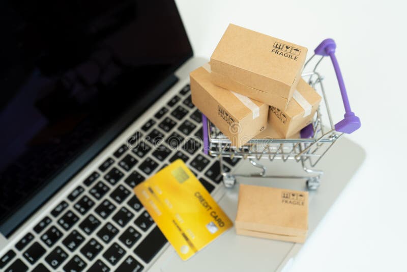 Online Shopping or Ecommmerce Delivery Service Concept,Paper Box on a ...