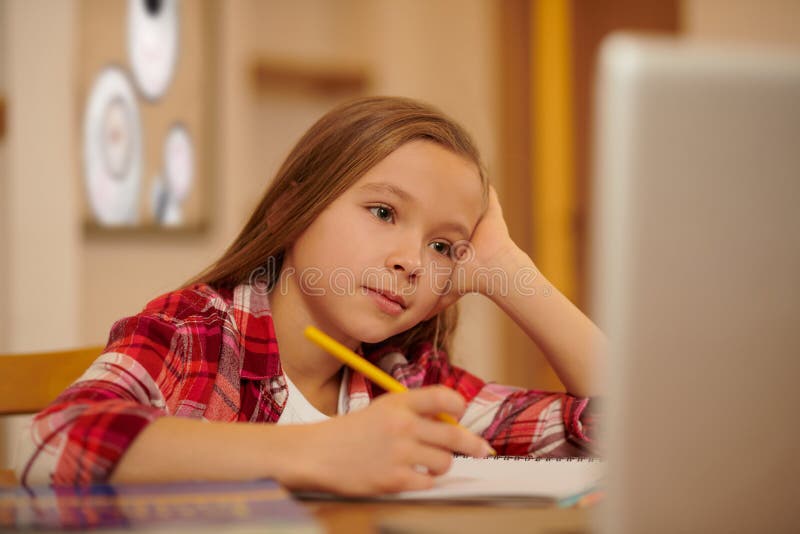 A Cute Long-haired Girl Having an Online Tutorial Stock Image - Image ...