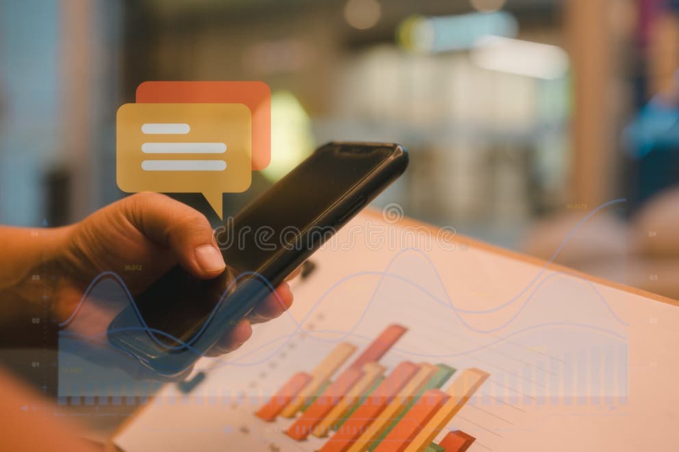 Online Trading and Social Media Man Analysing Data Chart and Using Smartphone Typing on ...