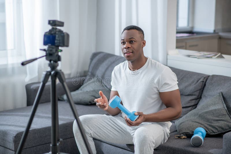 African American Young Man Having an Online Tutorial Stock Image ...