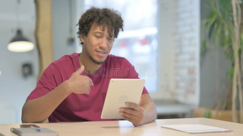 Online Video Chat on Tablet by African Man Stock Footage - Video of ...