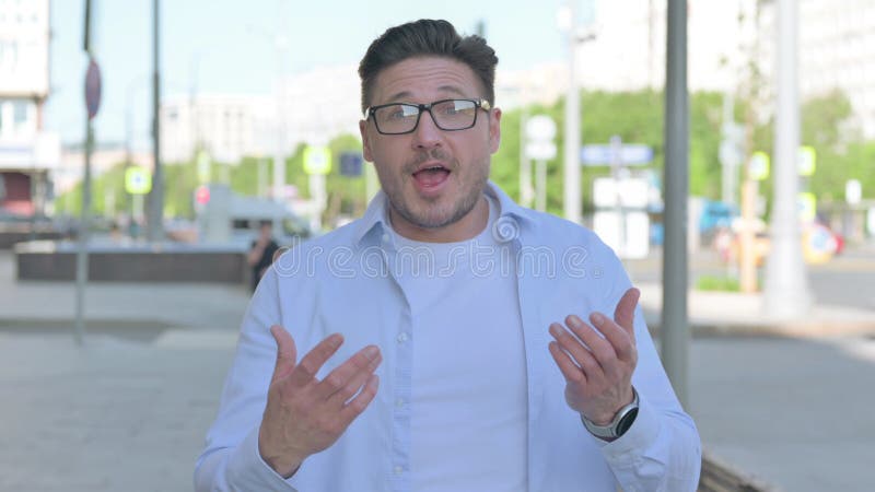 Online Video Chat by Talking Man Outdoor Stock Photo - Image of distant ...