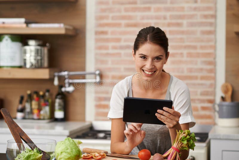 Online, Woman and Cooking with Recipe on Tablet in Kitchen To Watch ...