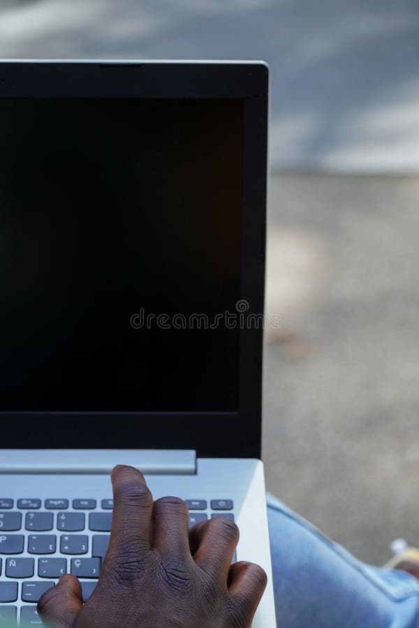 Online Working. Black Person Working with a Laptop Stock Photo - Image ...