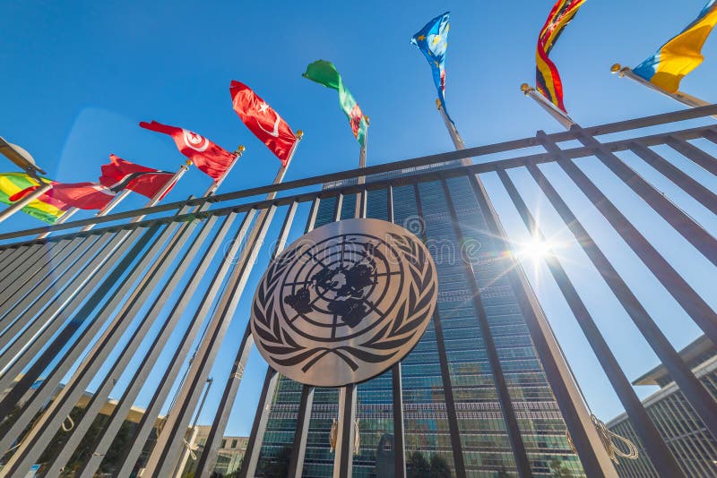 UN Building with Flags Under a Blue Sky in New York Editorial Photo ...