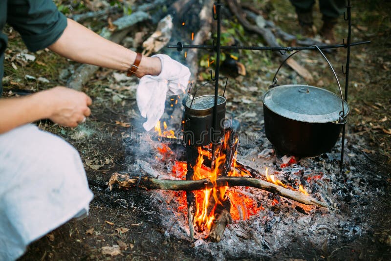 Ood is Cooked in a Pot Over a Campfire at Night Stock Photo - Image of ...