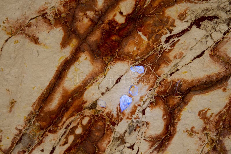 Opal Seam in UV Light stock image. Image of coober, volcanic - 247379837