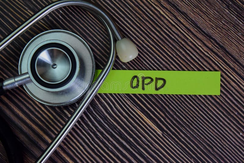 OPD Write on Sticky Notes Isolated on Wooden Table Stock Photo - Image ...