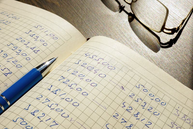 Open Accounting Book with Data and Pen. Home Finances Calculations ...