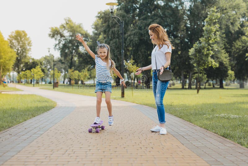 Good-looking Active Mother and Daughter on Open Air Stock Image - Image ...