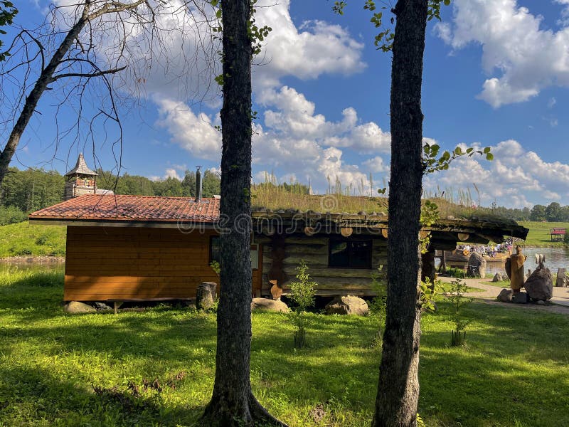 The Open-air Museum is a Rustic Hut with Grass Growing on the Roof ...