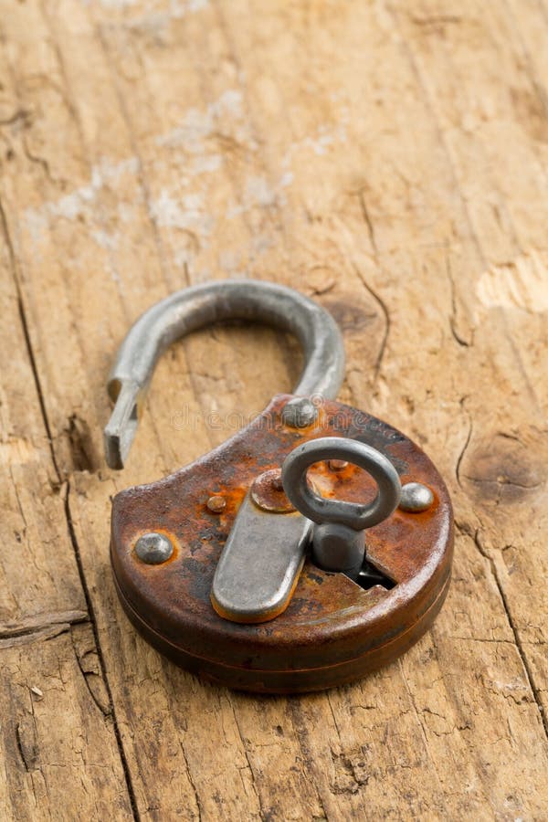 Open padlock on a gate stock photo. Image of green, lock - 31852308