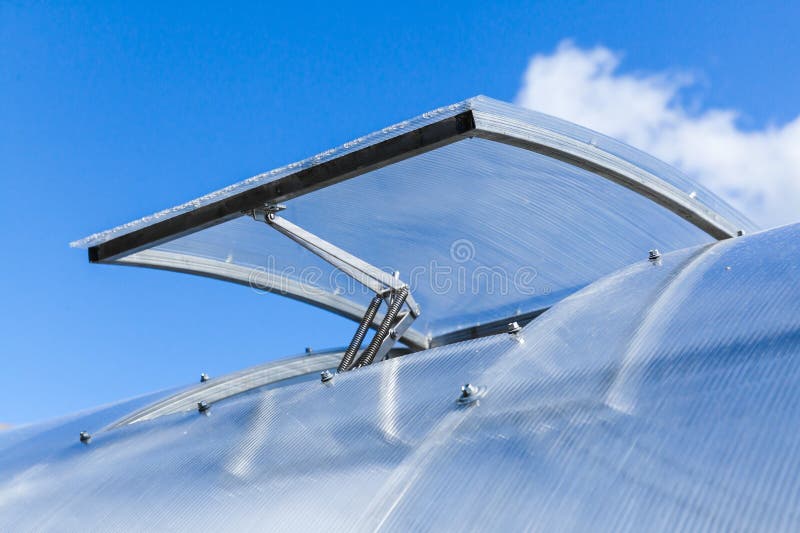 An Open Automatic Ventilation Vent on Modern Greenhouse Stock Photo ...