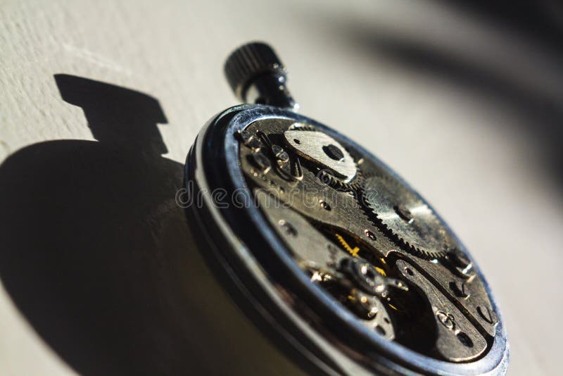 Pocket watch and shadow 2 stock image. Image of shadow - 110873055