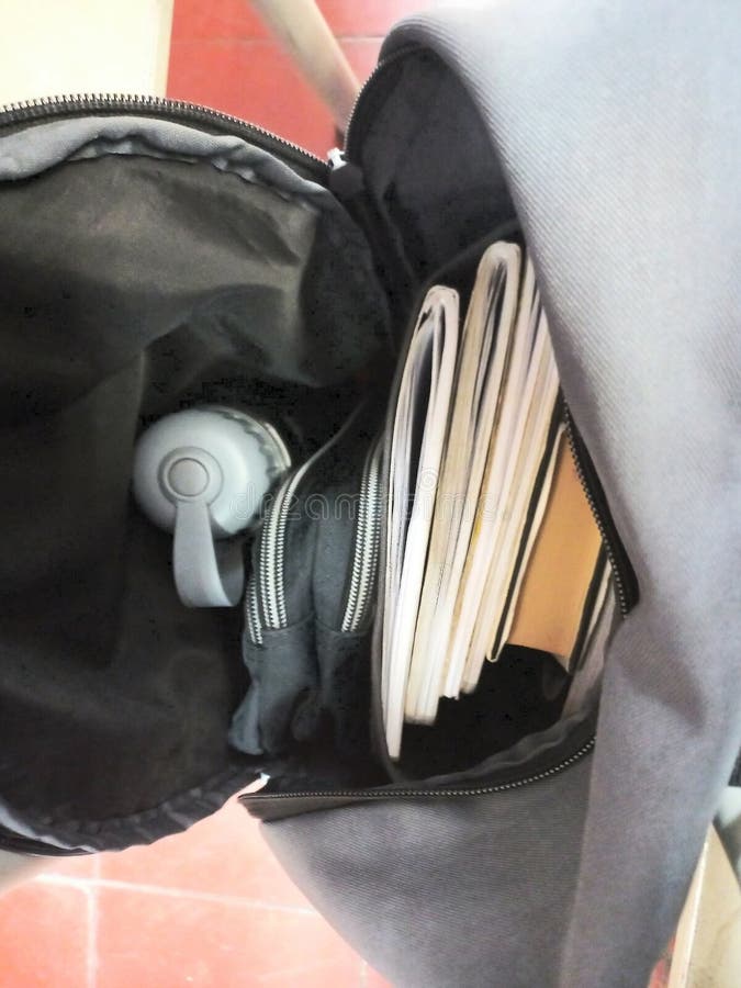 Open Bag with Notes and a Water Bottle Inside Stock Image - Image of ...