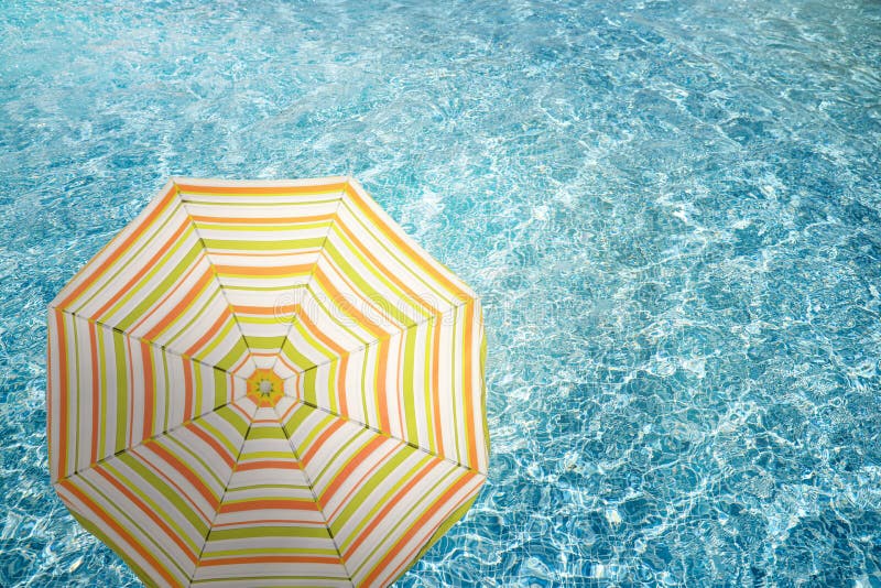 Open Beach Umbrella and Swimming Pool. Summer Vacation Stock Photo ...