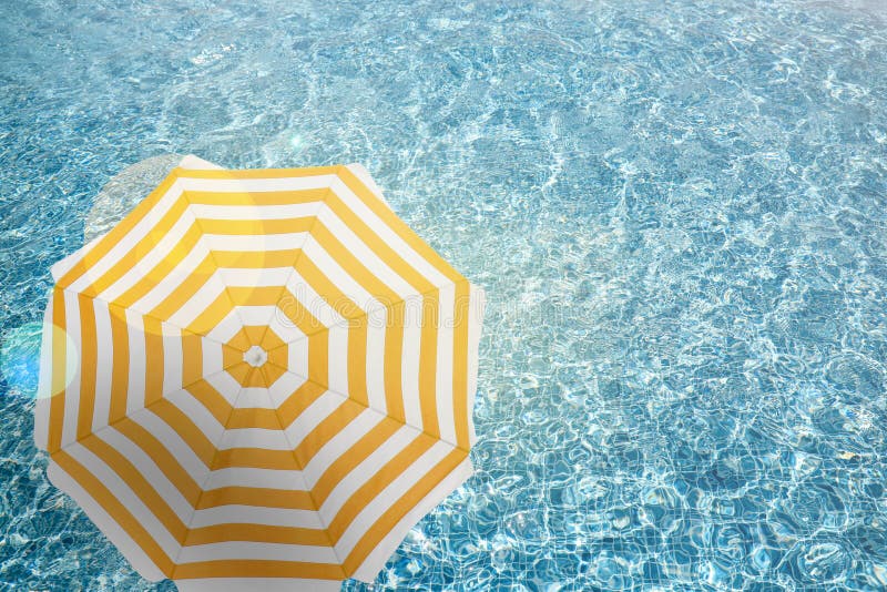 Open Beach Umbrella and Swimming Pool. Summer Vacation Stock Photo ...