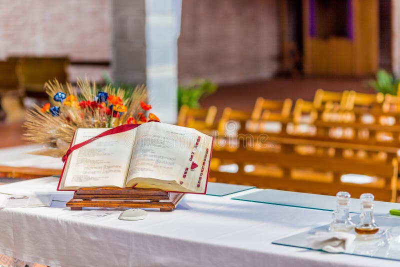 Open Bible on the Altar of Catholic Church Stock Photo - Image of ...
