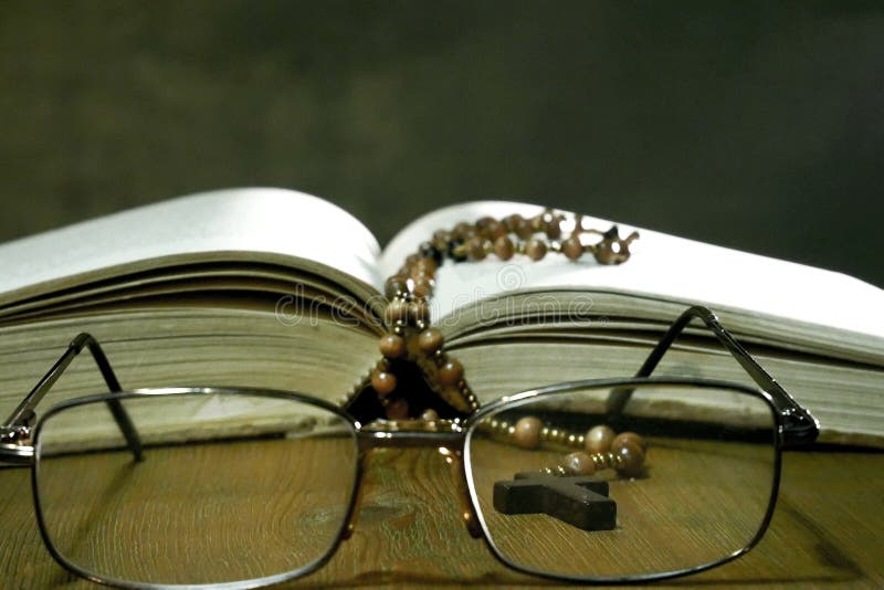Open Bible with Glasses stock photo. Image of religion - 109906640