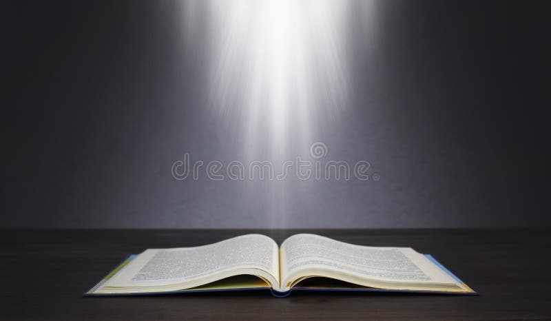 Open Bible. Holy Bible on the Table. Light from a Book. Stock Image ...