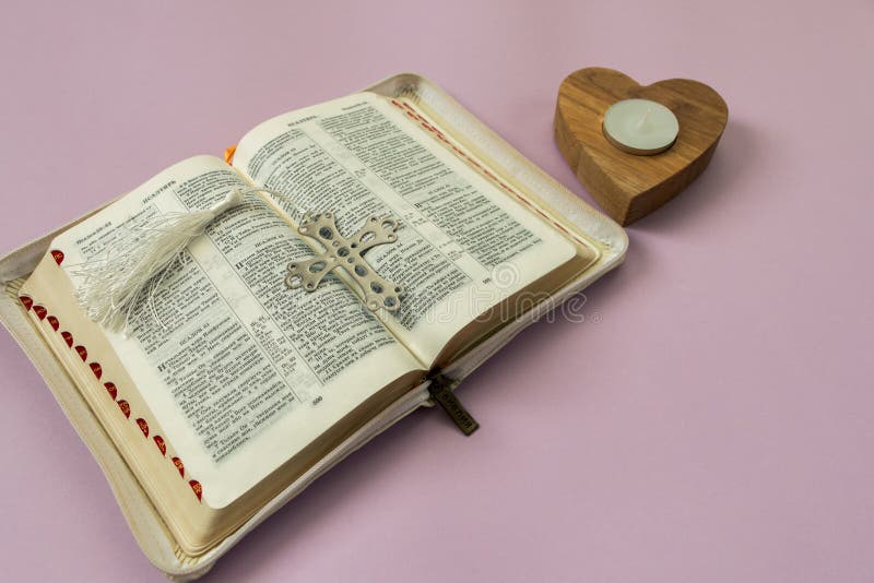 Open Bible in Russian Cross and Candle Holder in the Shape of a Heart ...