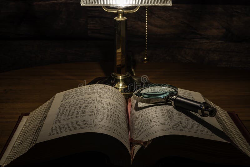 Open Bible on Table with Magnifying Glass Stock Image - Image of study ...