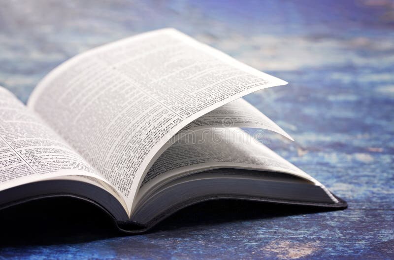Open Bible on a Wooden Table Stock Image - Image of blue, religion ...