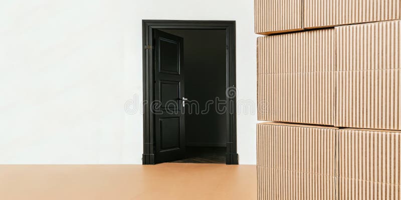 Open Black Door Next To Stack of Cardboard Boxes in Minimalist Space ...