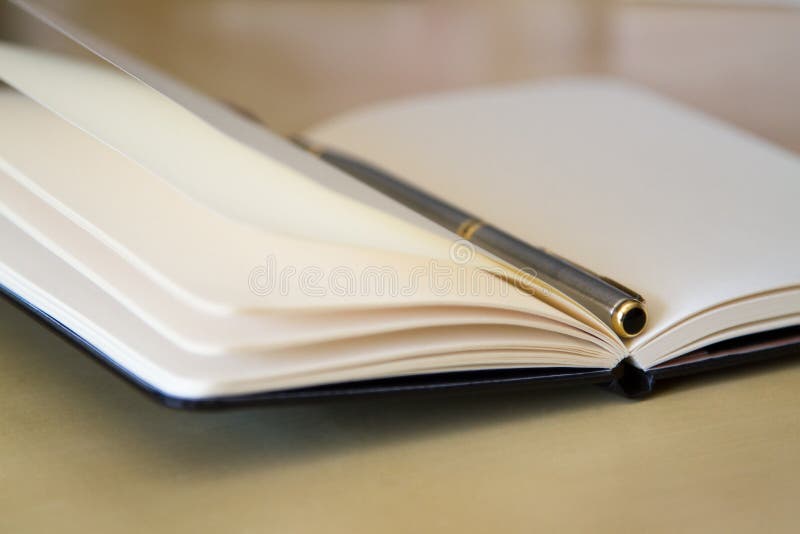 An Open Blank Notebook with a Pen, Close Up Stock Photo - Image of ...