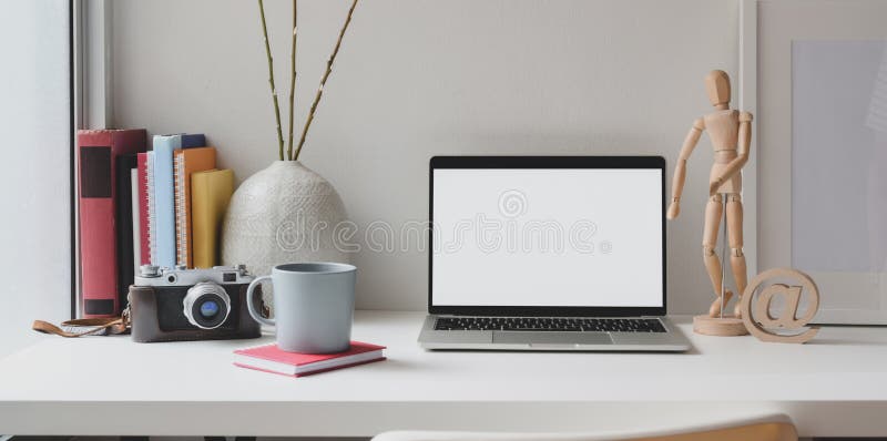 Open Blank Screen Laptop Computer with Camera, Books and Coffee Cup ...