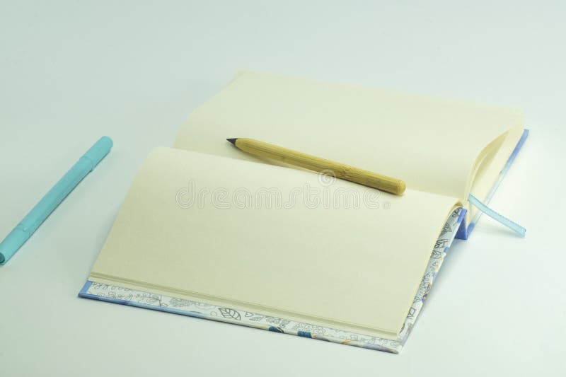 Open Blank Sketchbook with Pencil or Pen for Study Notes or Drawings on ...