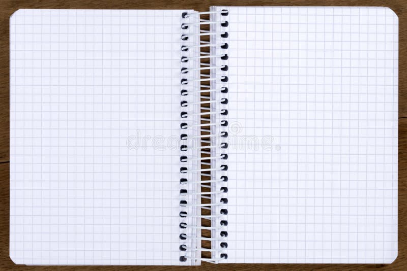Open Blank Spiral Bound Notebook with Squared Paper on the Oak Table ...