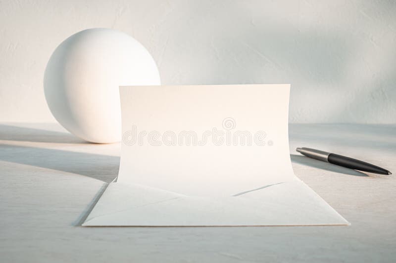 Blank White Paper in Envelope with Pen on Brightly Lit Table Stock ...