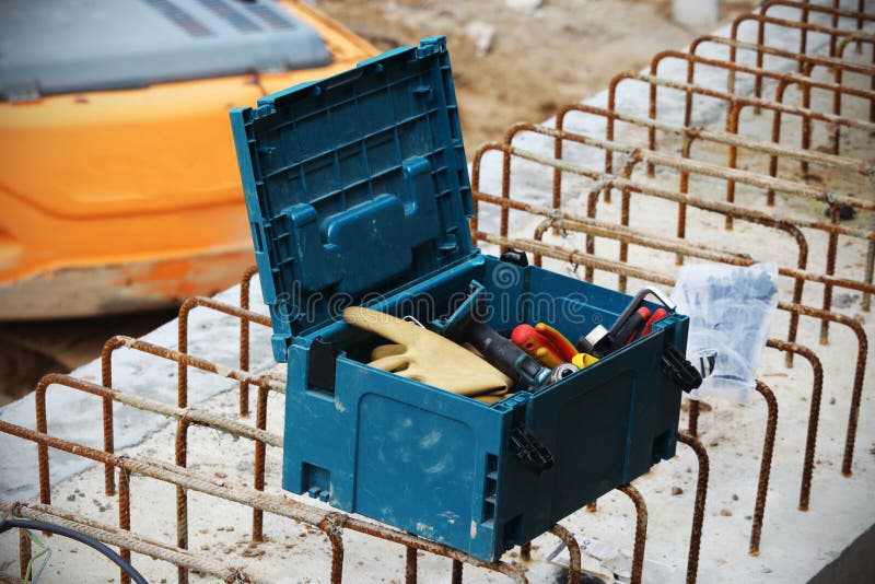 Open Blue Dirty Tool Box with Various Tools and Gloves Stock Photo ...