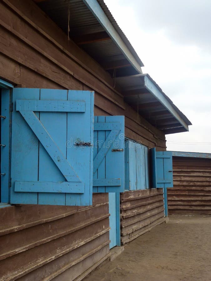 Open Blue Shutters in a Wooden Old House in Perspective Stock Image ...