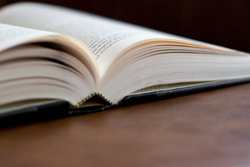 Open Book on Leather Desk stock image. Image of hardcover - 3243537