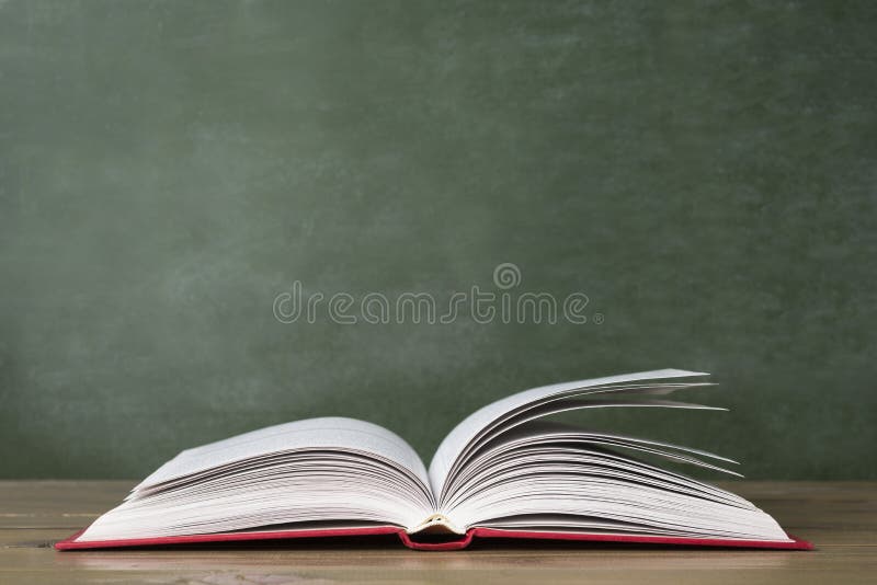 Open Book Against Green Chalkboard, Close Up Stock Image - Image of ...