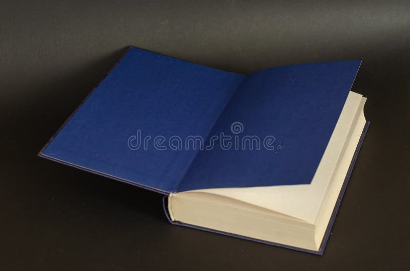 Open Book on a Black Background. Textbook with Blue Endpapers Stock ...