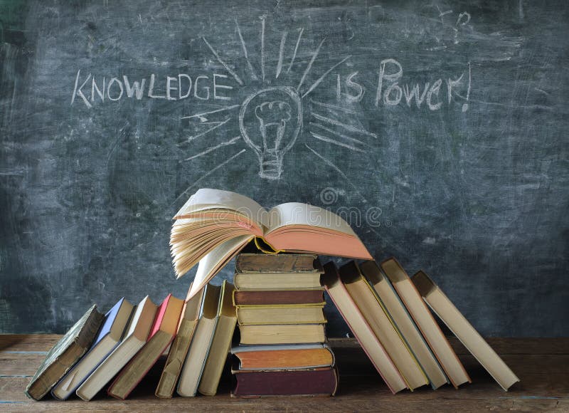 Open Book and Blackboard with Drawing of a Lightbulb and Slogan ...