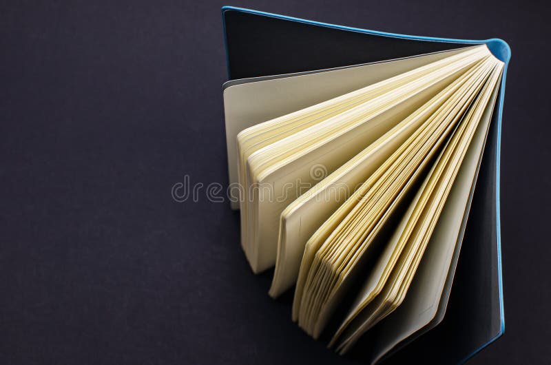An Open Book with a Blue Leather Cover. View from Above Stock Photo ...